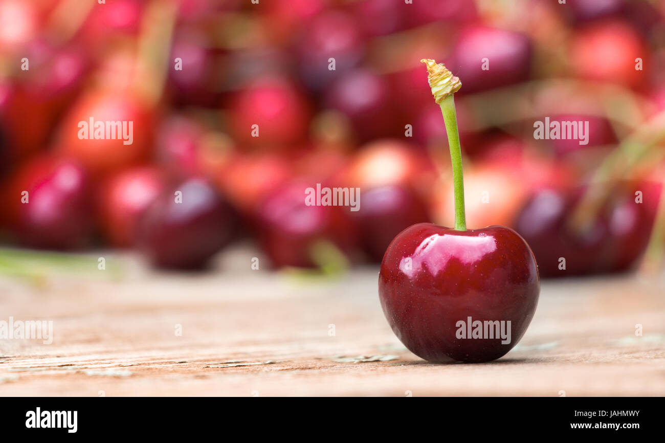 Unique concept. Conceptual image with cherries on a table, unique ...