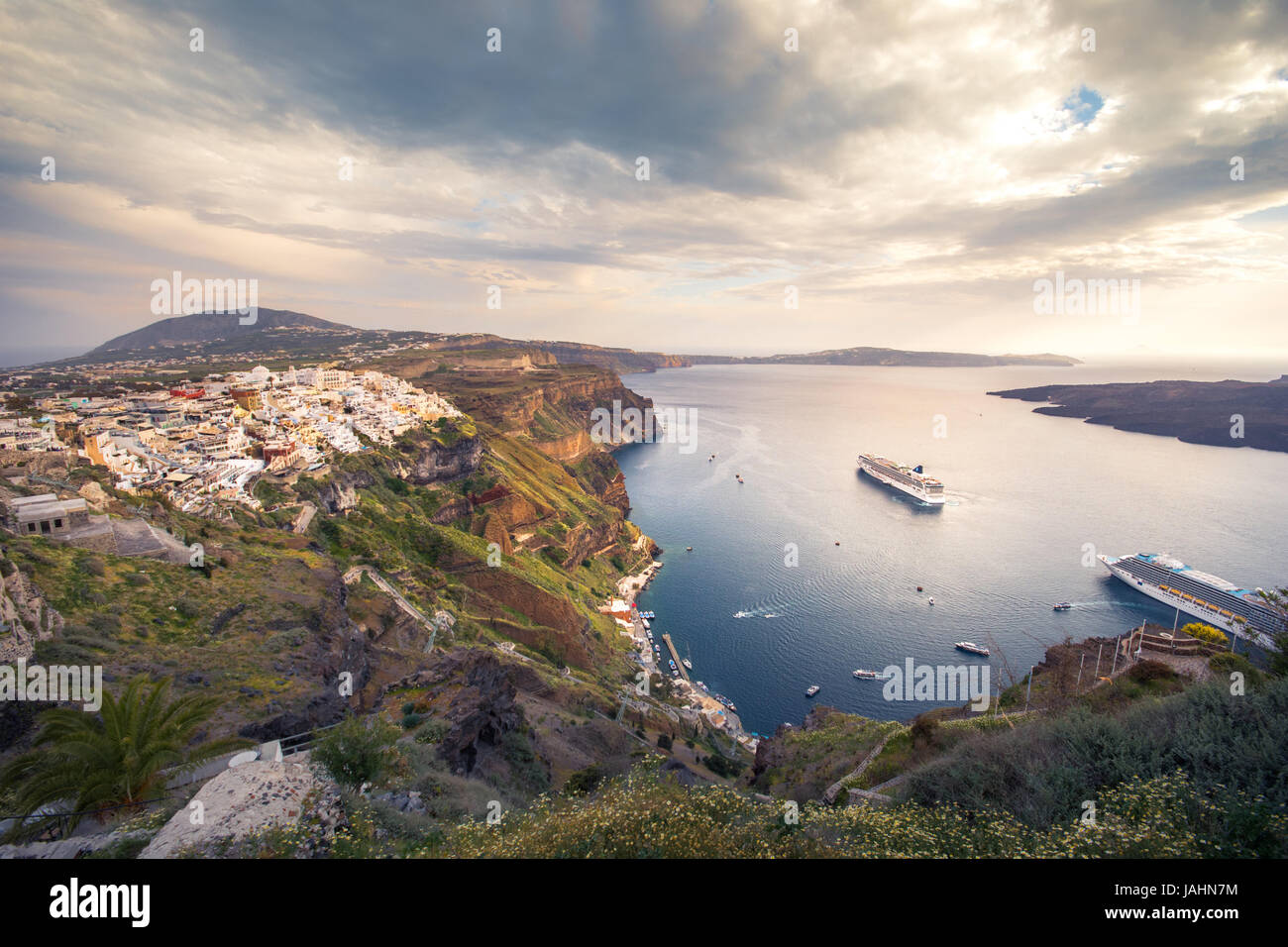 Amazing evening view of Fira, caldera, volcano of Santorini, Greece ...