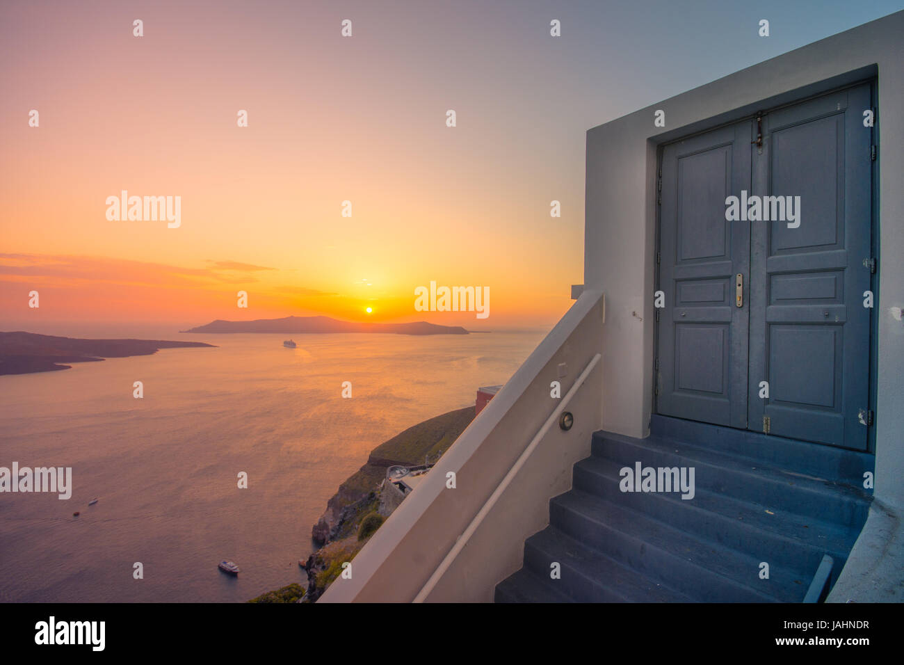 Amazing evening view of Fira, caldera, volcano of Santorini, Greece ...