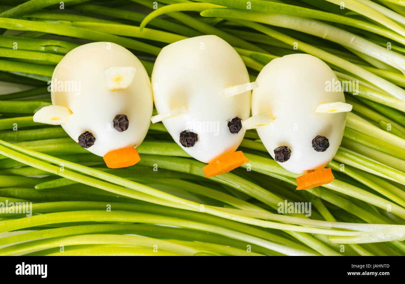 Children food, little pigs of quail eggs Stock Photo - Alamy