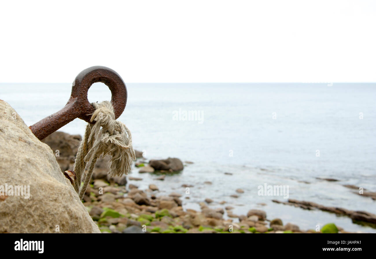 Rope tied on the hook Stock Photo - Alamy