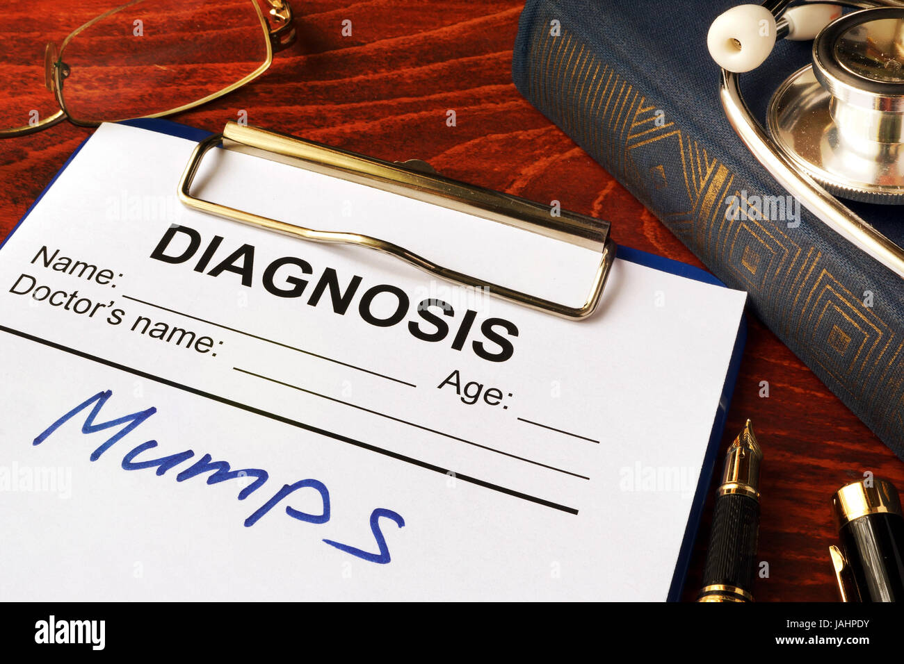 Medical form with diagnosis Mumps on a table Stock Photo - Alamy