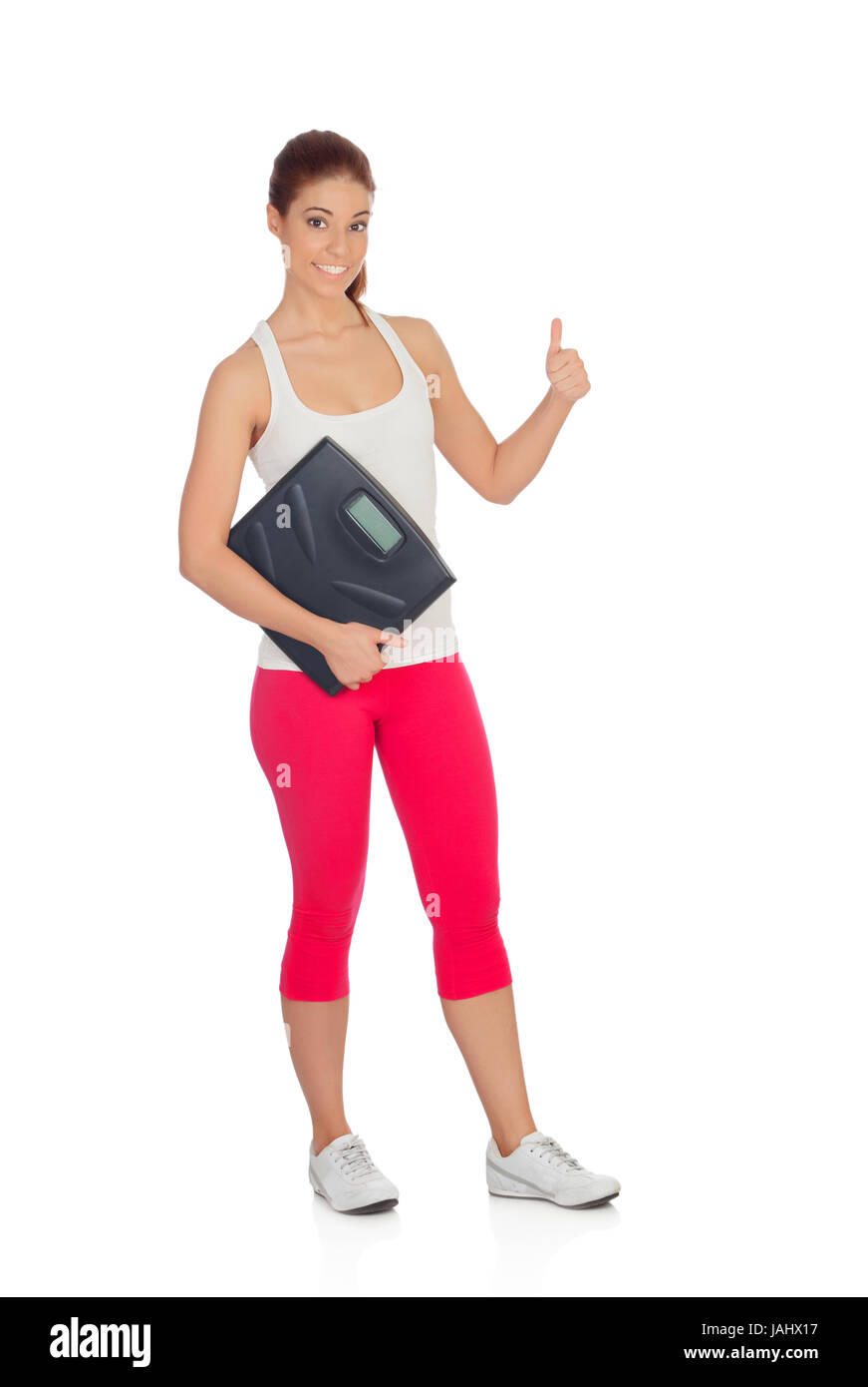 Pretty woman on seeing his new weight scale saying Ok isolated on a ...