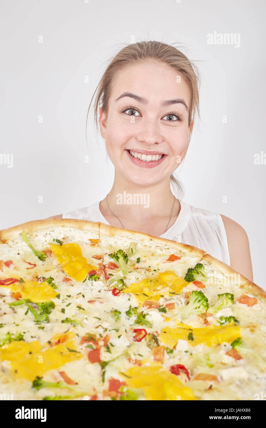 fun girl present pizza on white background Stock Photo - Alamy