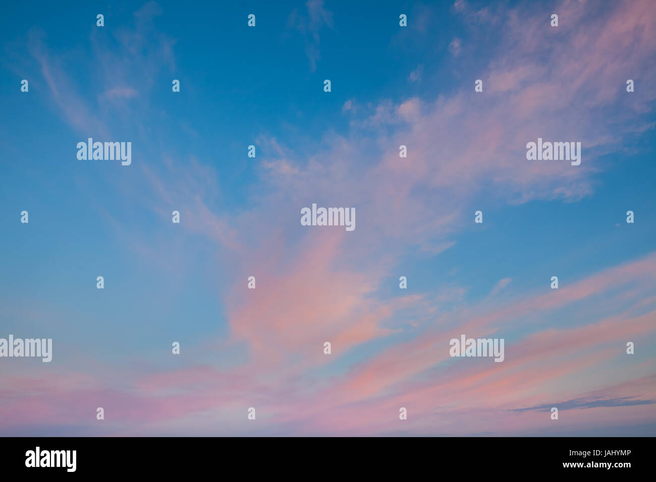 Blue sky with magenta clouds with sunrise Stock Photo - Alamy