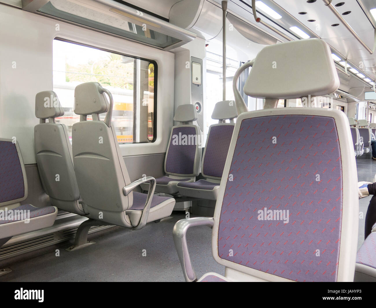 Empty seats in train wagon indoor. Interior of the high-speed train ...