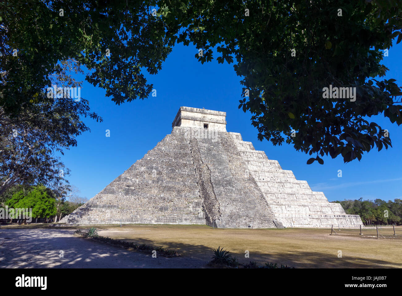 Pyramid known as El Castillo in the ancient Mayan ruins in Chichen Itza ...