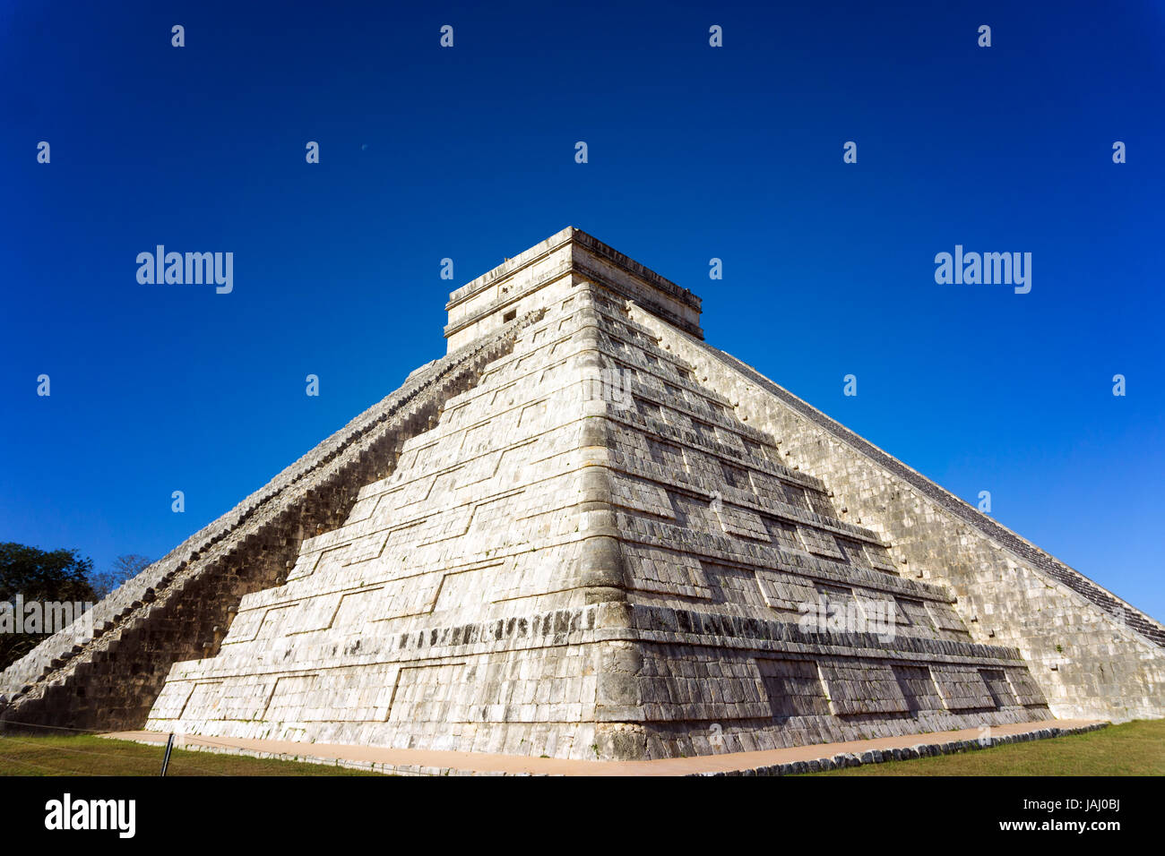 View of the pyramid, known as El Castillo in the Mayan ruins of Chichen ...