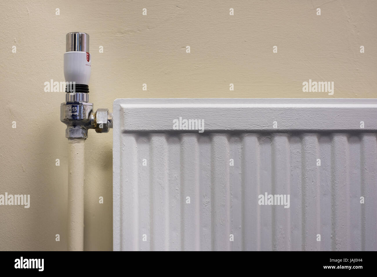 Thermostat on a radiator as part of gas central heating system Stock ...
