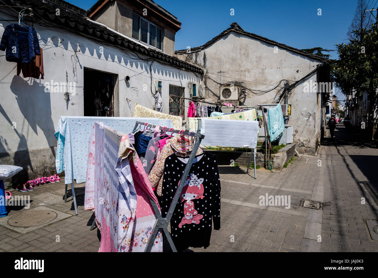 Washing drying outside in the street, Pingjiang Road, ancient district ...