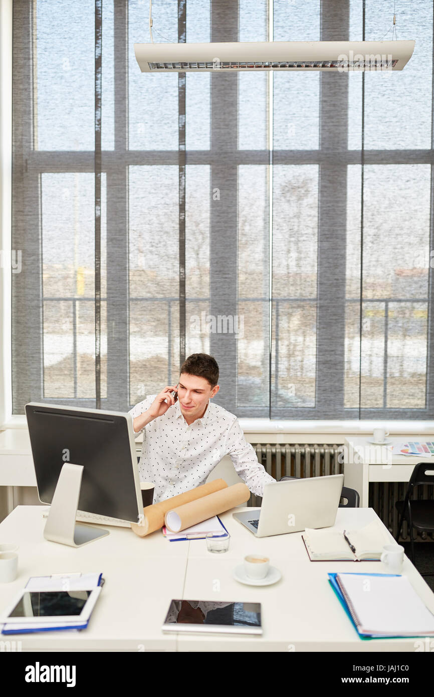 Multitasking in business hi-res stock photography and images - Alamy