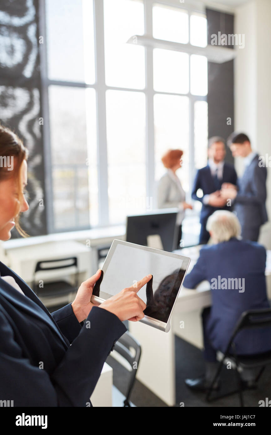 Woman uses tablet hi-res stock photography and images - Alamy