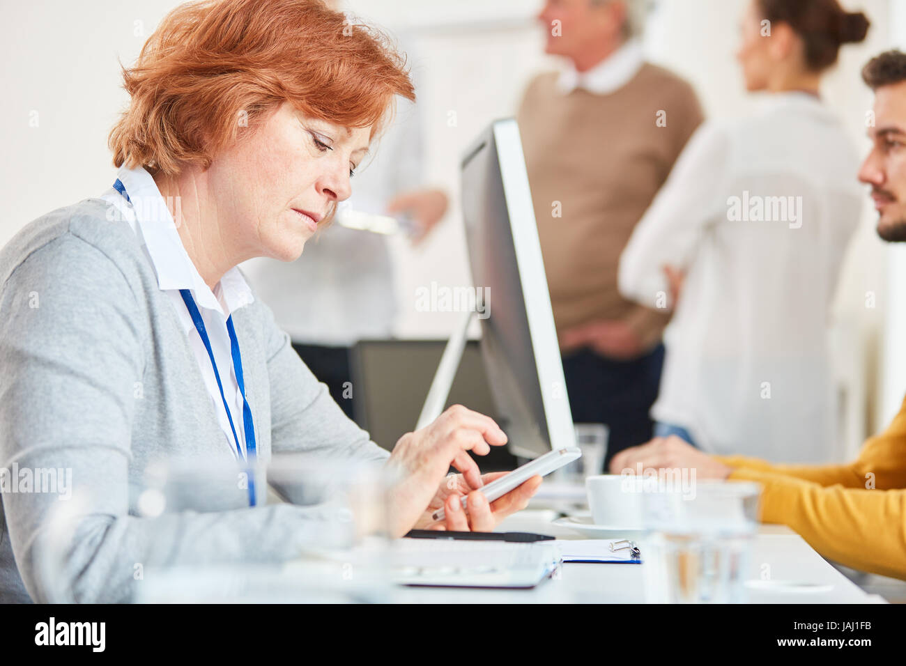 Office staff writing hi-res stock photography and images - Alamy