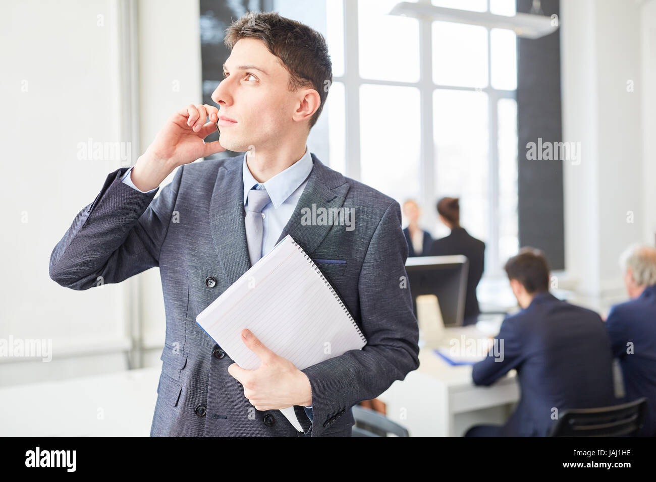 Young business man making call hi-res stock photography and images - Alamy