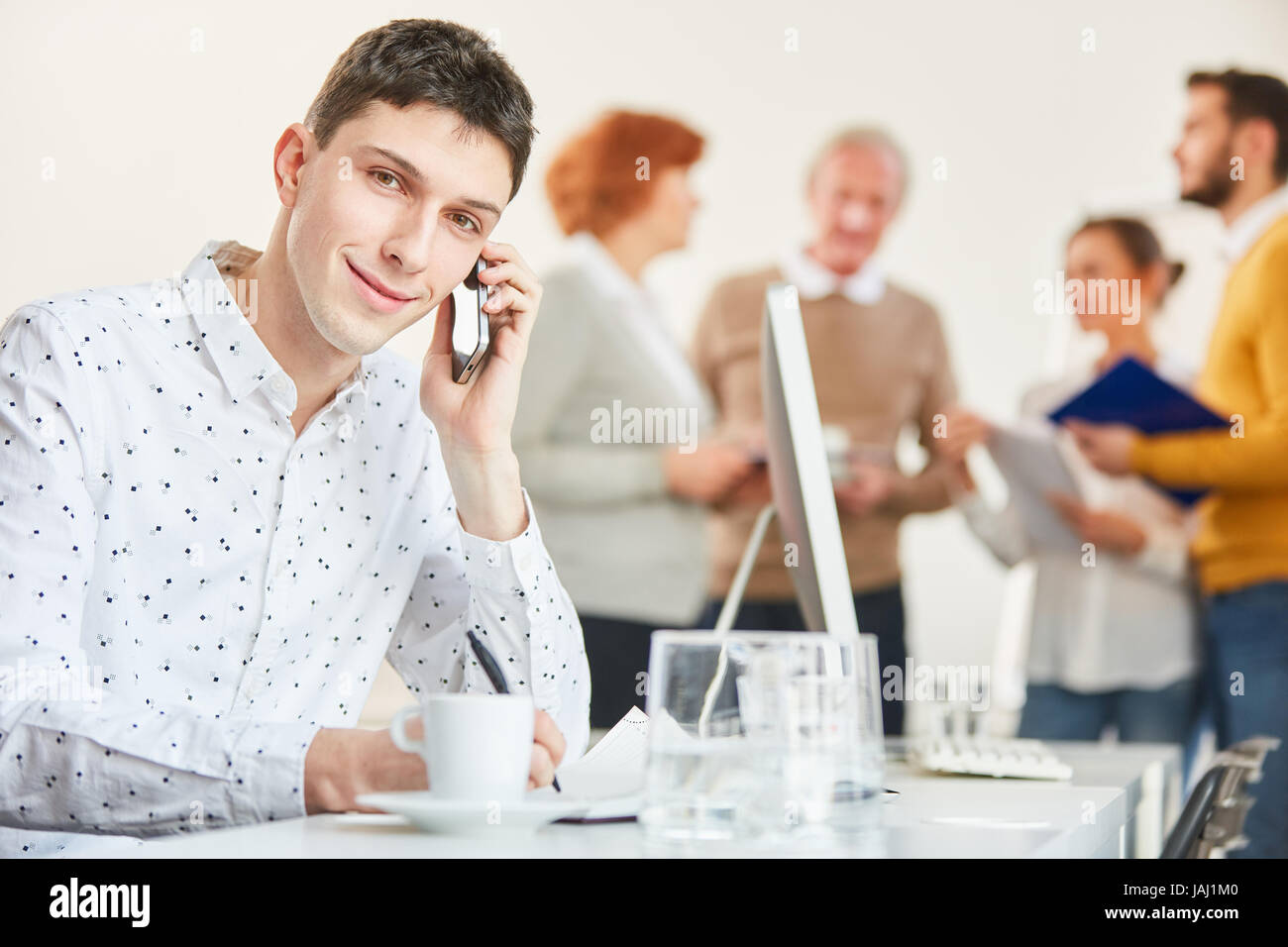 Student calling business hotline service with smartphone Stock Photo ...