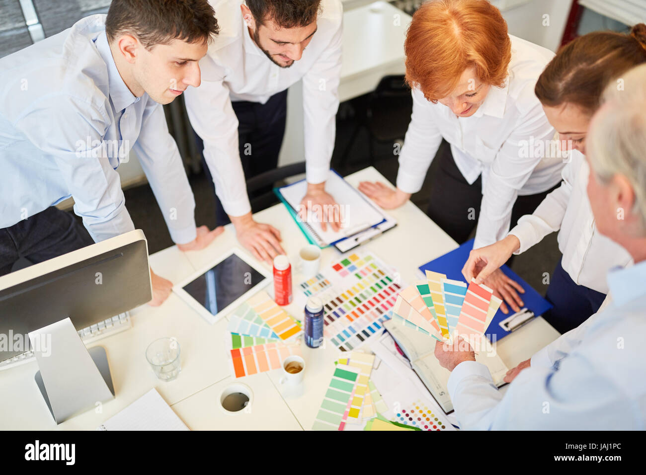 Designer team in creative workshop choosing with color palette Stock ...