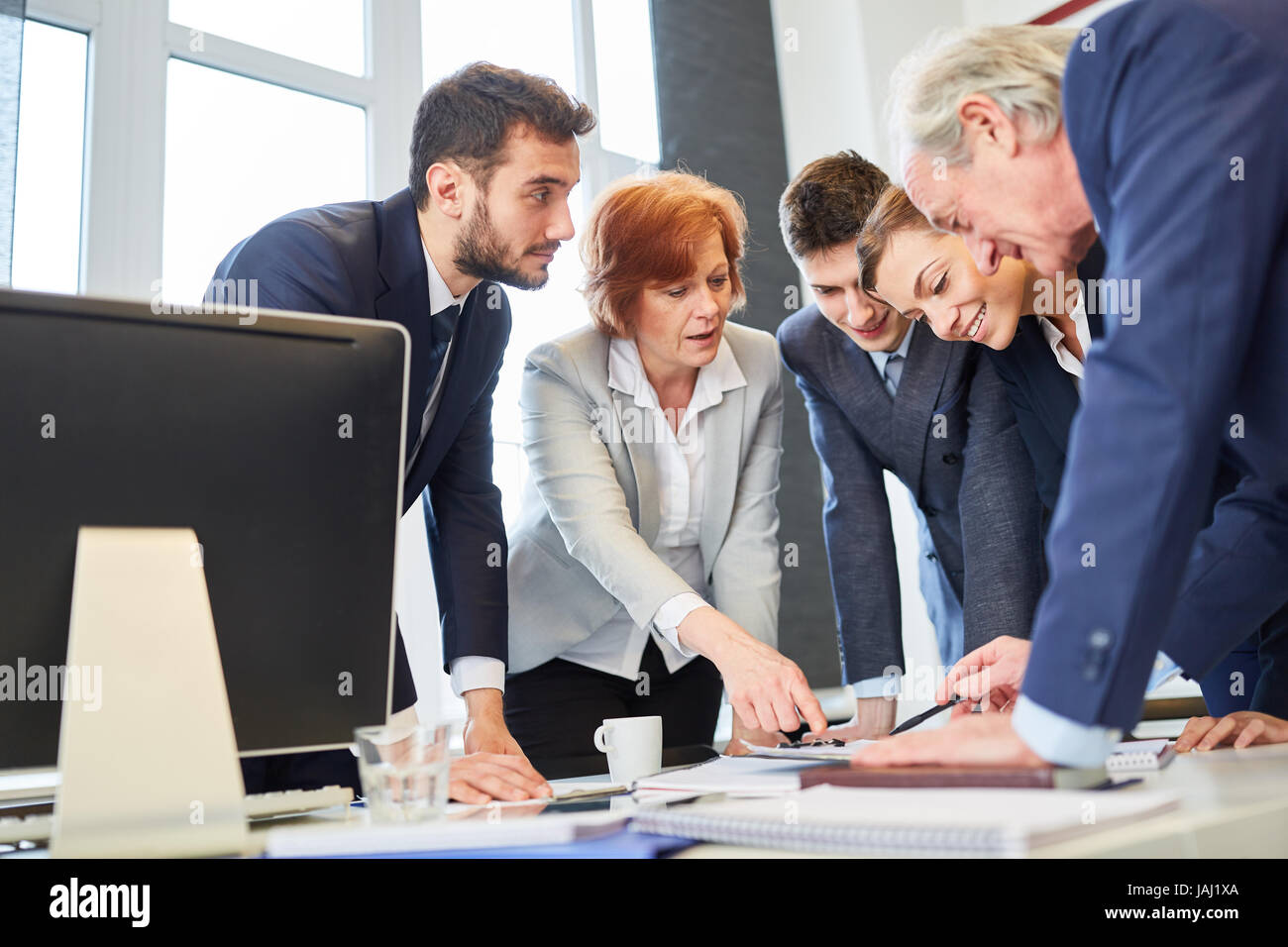 Team and consulting man planning new strategy in meeting Stock Photo ...