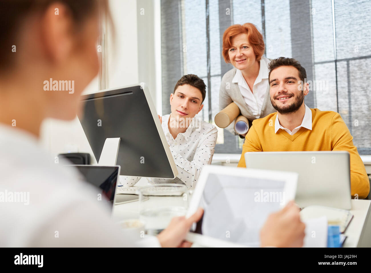 Business team in computer training with tablet and laptop Stock Photo ...