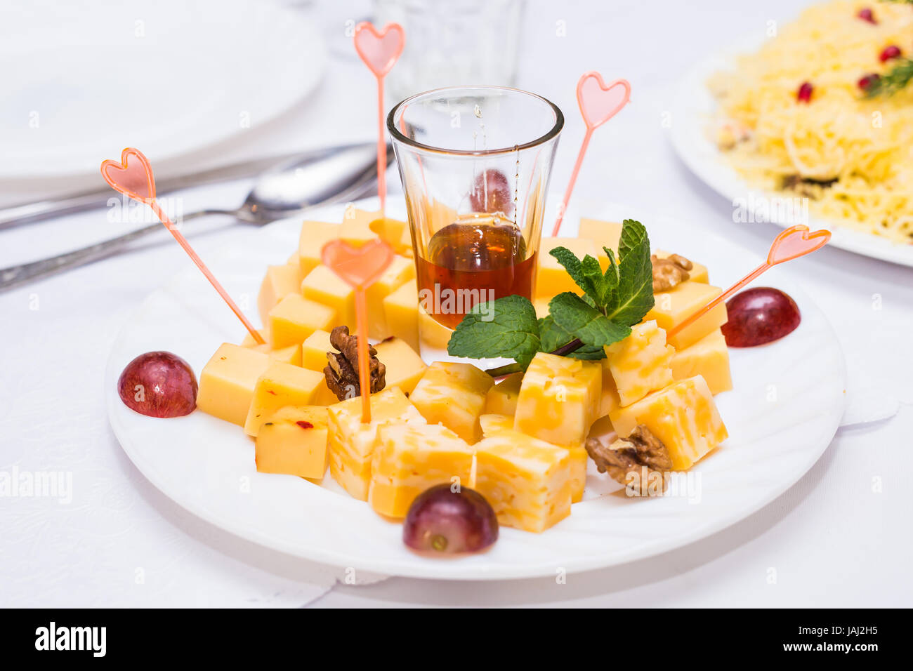 Cubes of yellow cheese Stock Photo - Alamy