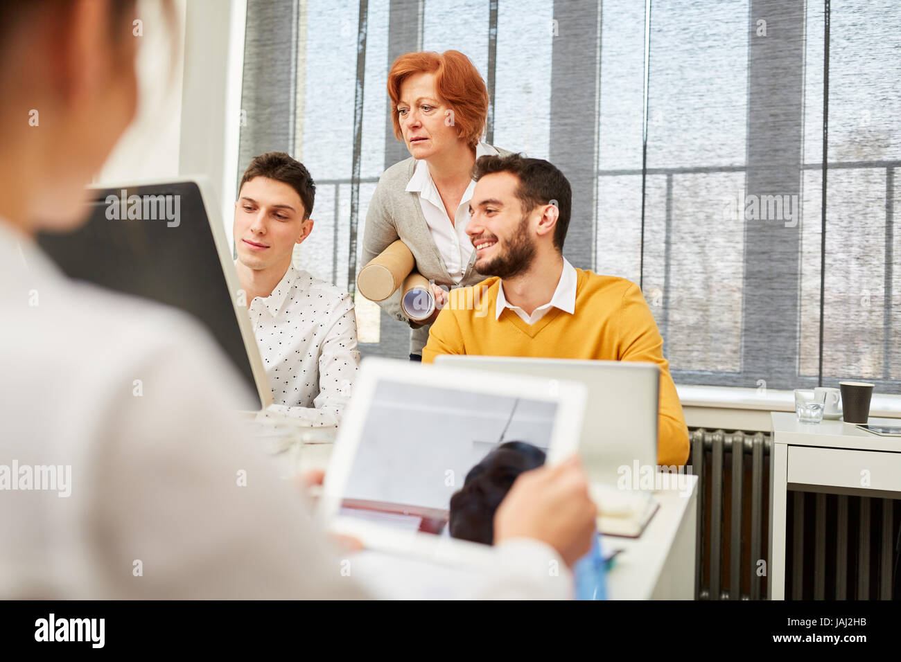 Team working online in internet in cooperation at their office Stock ...