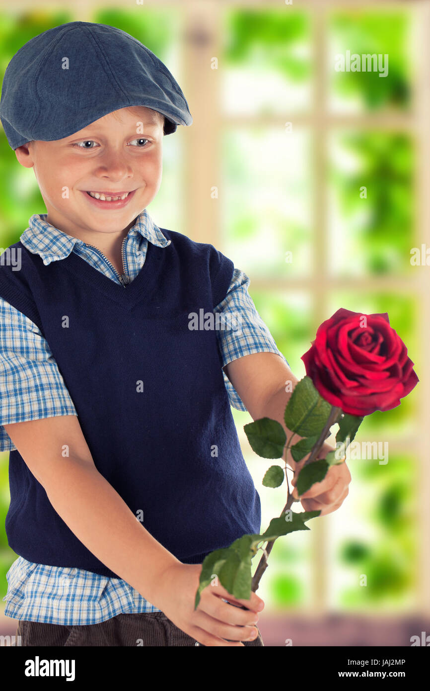 child presents rose Stock Photo - Alamy