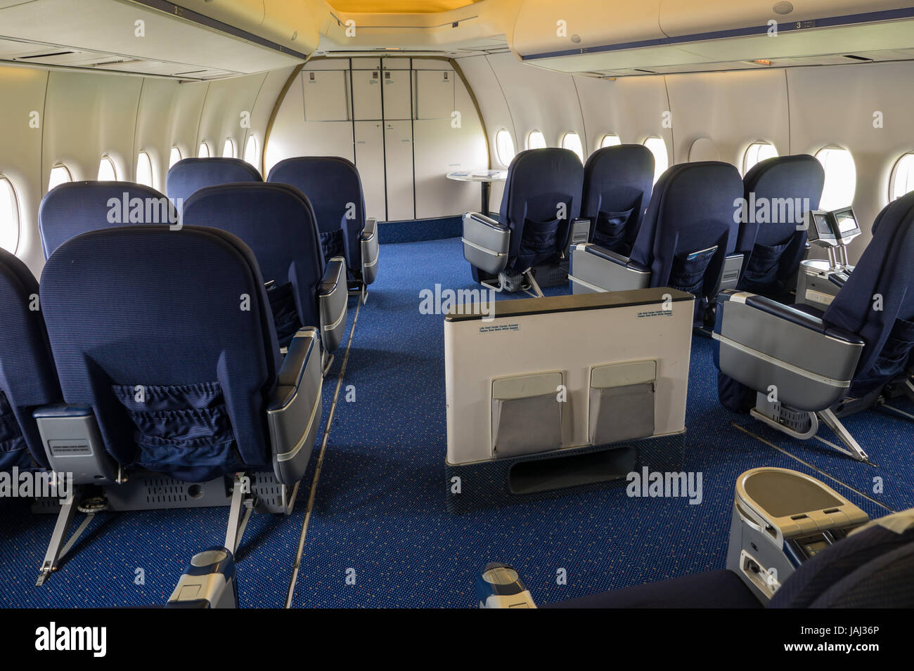 Inside the business class passenger cabin of a jumbo jet airliner Stock ...