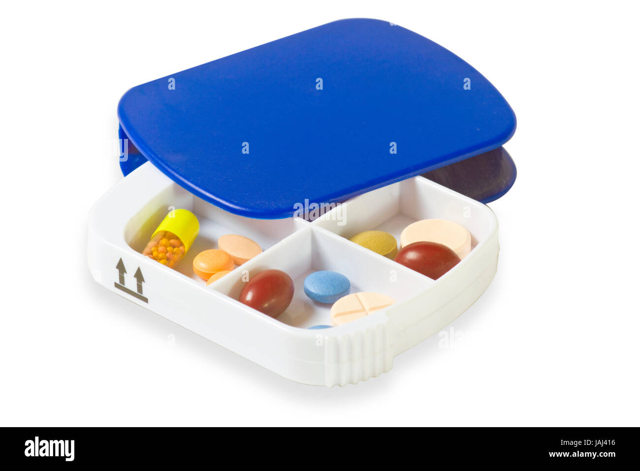 Pill Box with pills on bright background Stock Photo - Alamy
