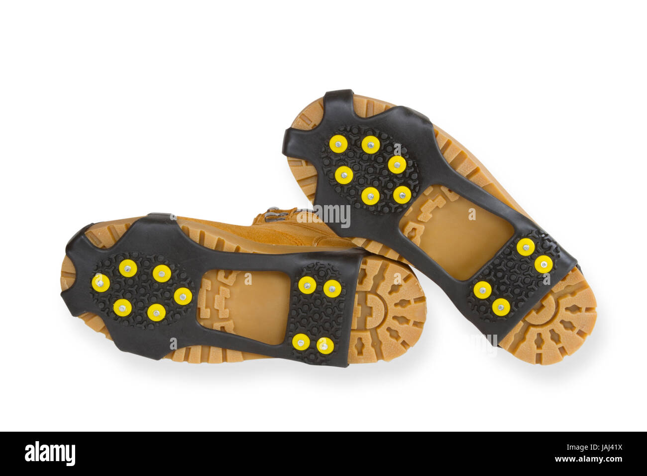 Shoe spikes on boots isolated on white background Stock Photo - Alamy