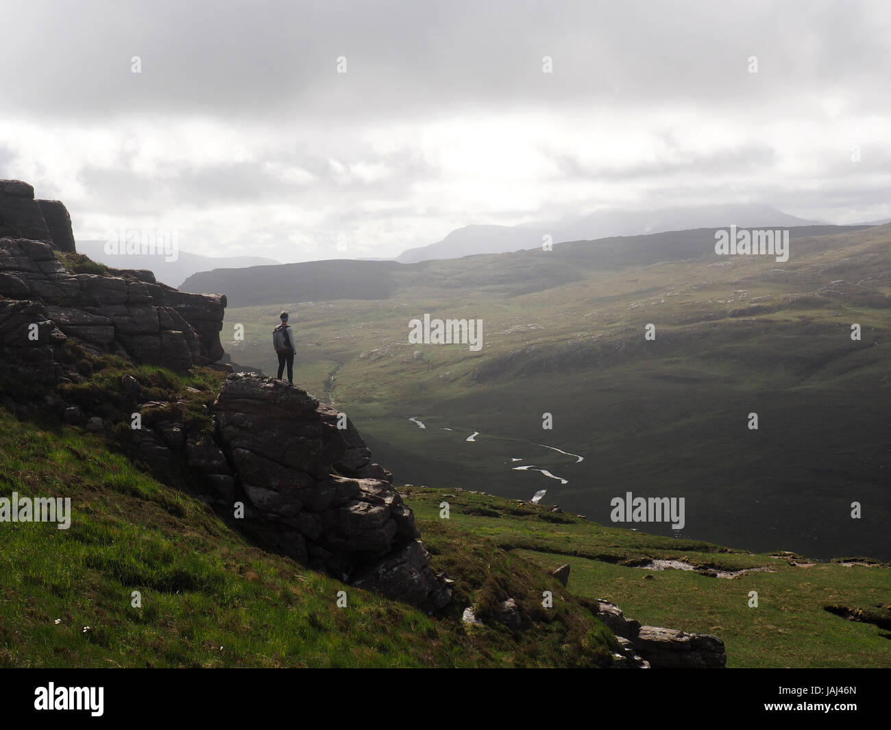 Walker on slopes of An Grianan, Cape Wrath, Scotland Stock Photo - Alamy