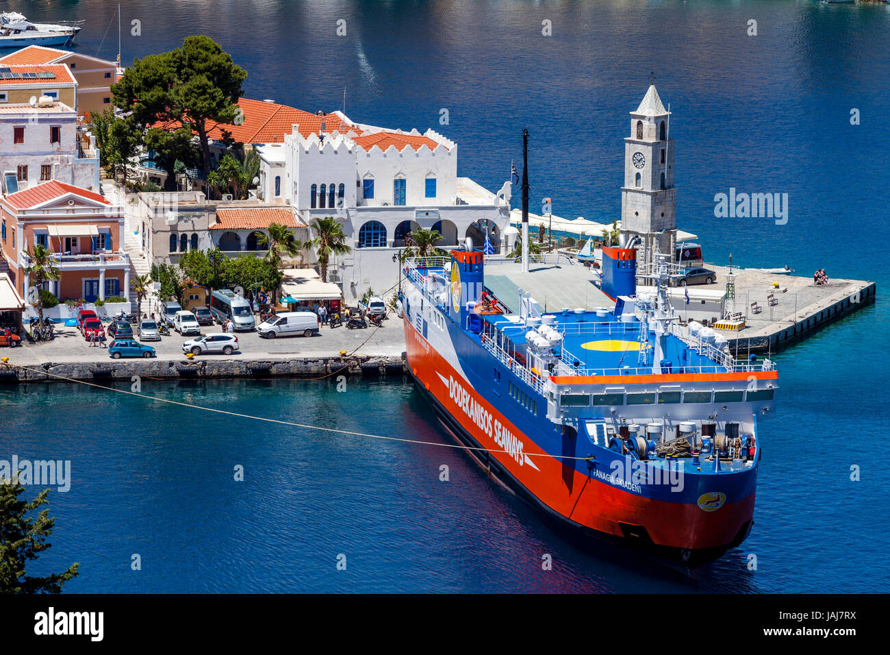 Colourful Houses and The Dodekanisos Seaways Ferry, Symi Island ...