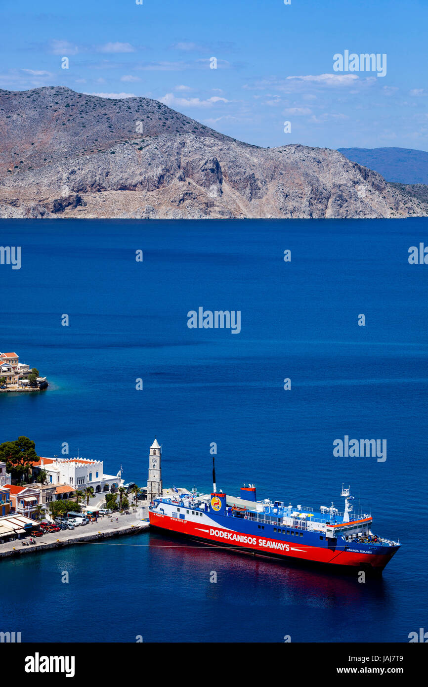 Colourful Houses and The Dodekanisos Seaways Ferry, Symi Island ...
