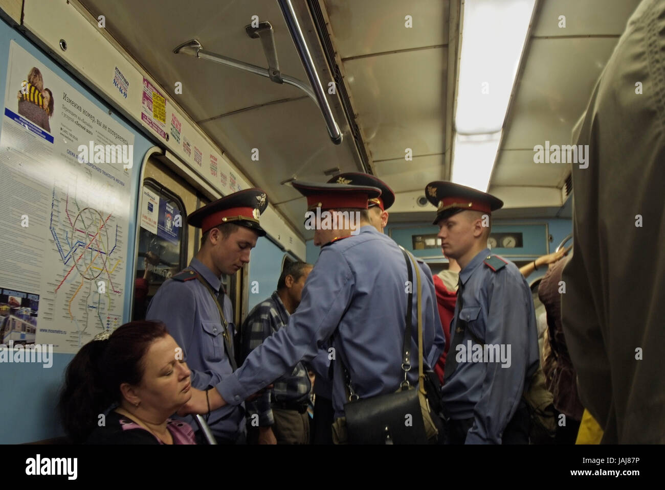 Moscow Metro, russian metro police in the metro train, Moscow, Russia ...