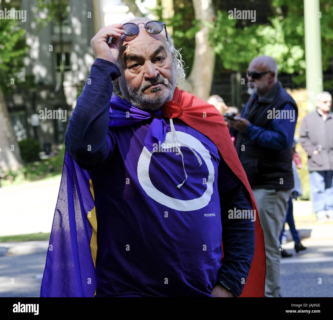 People take part in the Labour Day march held in downtown Madrid. Labor ...