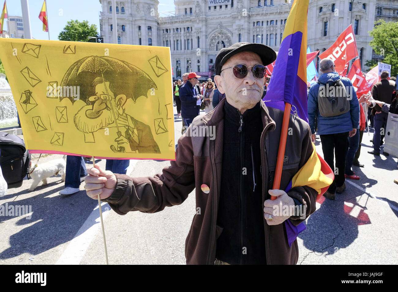 People take part in the Labour Day march held in downtown Madrid. Labor ...