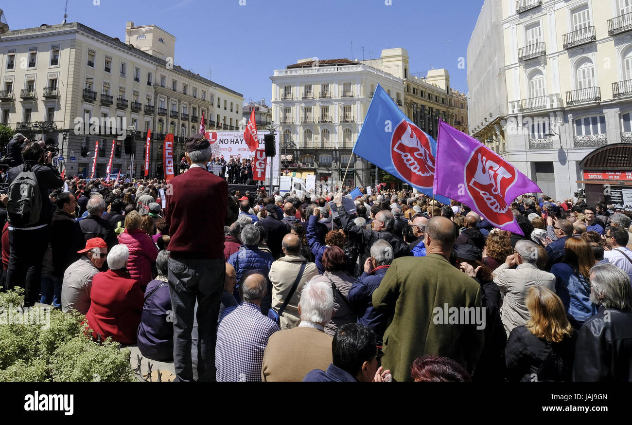 People take part in the Labour Day march held in downtown Madrid. Labor ...