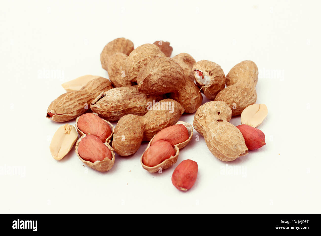 Peanuts isolated on white background Stock Photo - Alamy