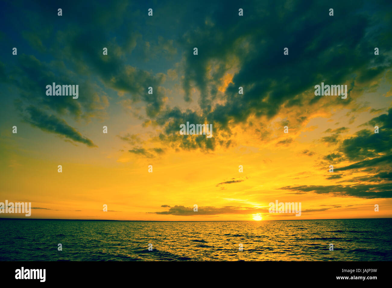 Magic sunset over the sea Stock Photo - Alamy