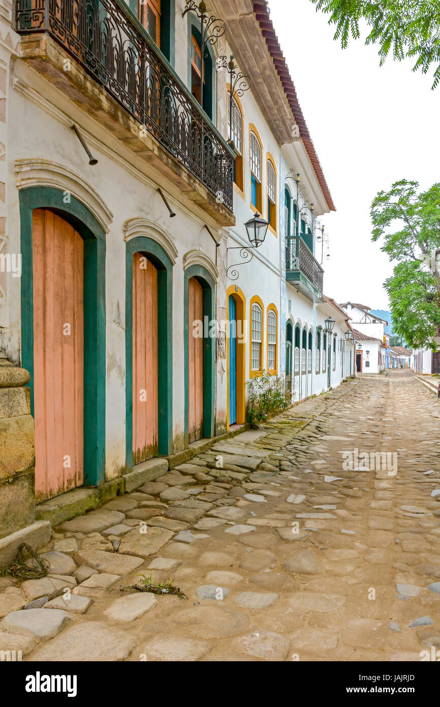 Street with old houses in colonial style with the traditional ...