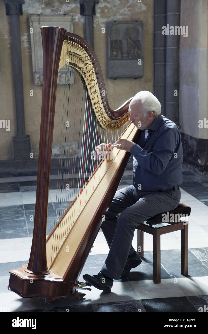 Play harp hi-res stock photography and images - Alamy