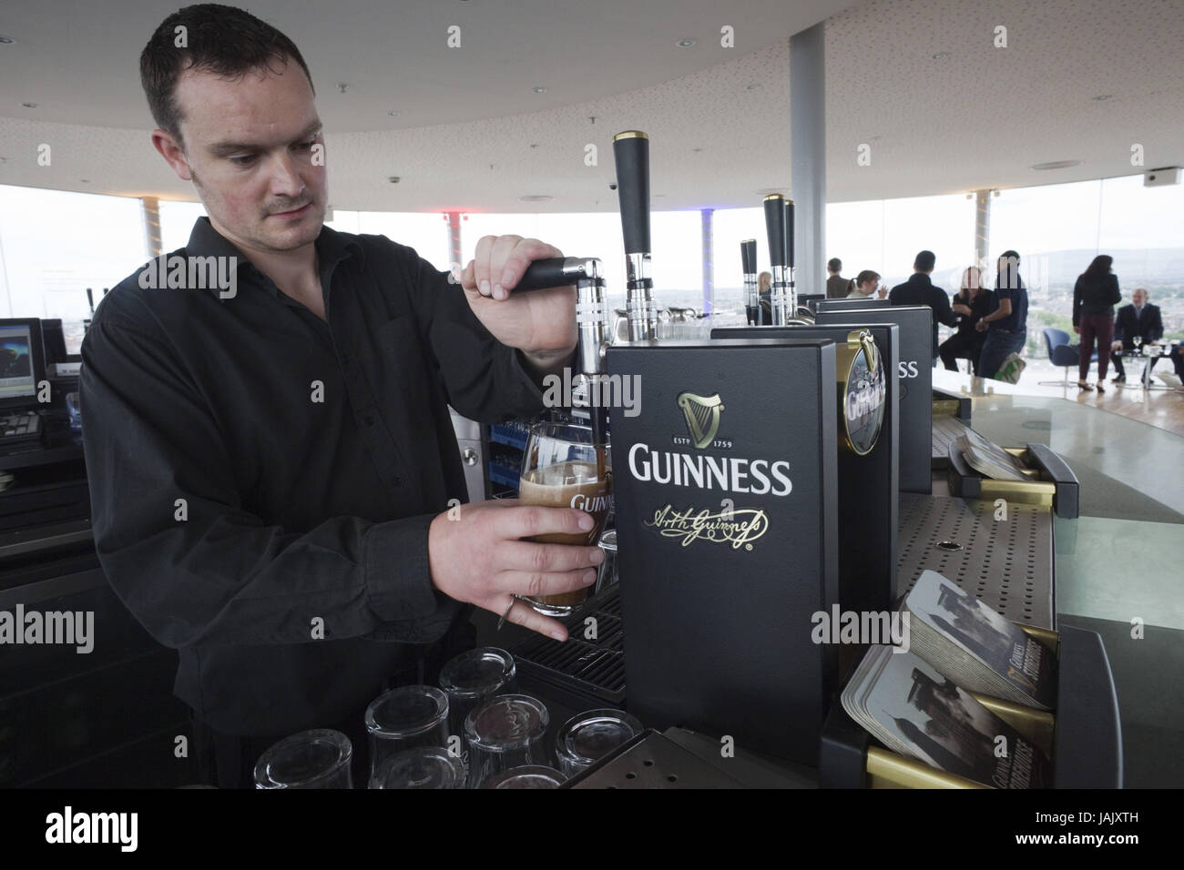 Guinness bar tap hi-res stock photography and images - Alamy