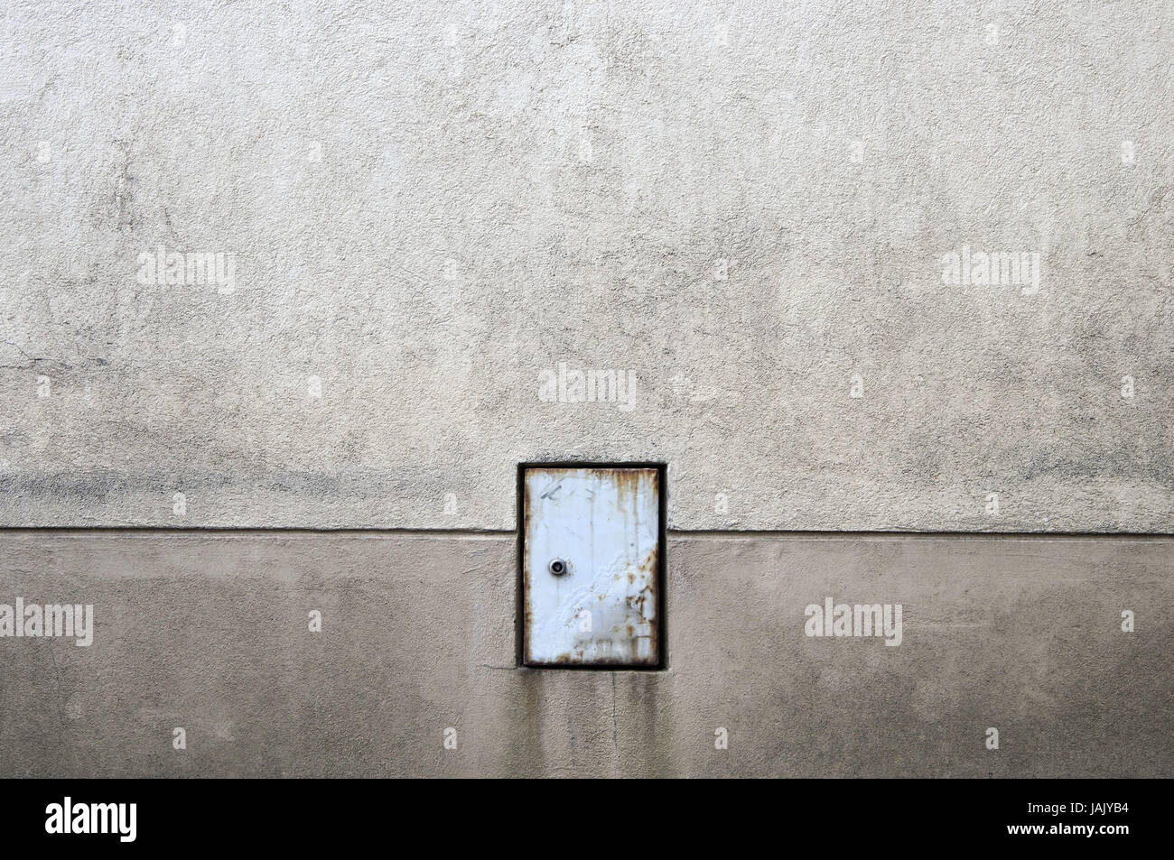 Conception,metal speaker in the wall of a house Stock Photo - Alamy