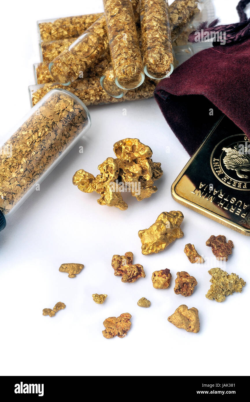 nuggets and gold bullion in studio on white background Stock Photo - Alamy