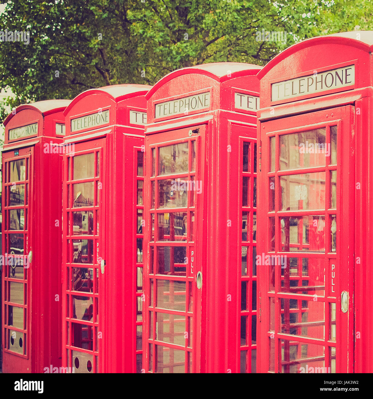 Vintage looking Traditional red telephone box in London UK Stock Photo ...