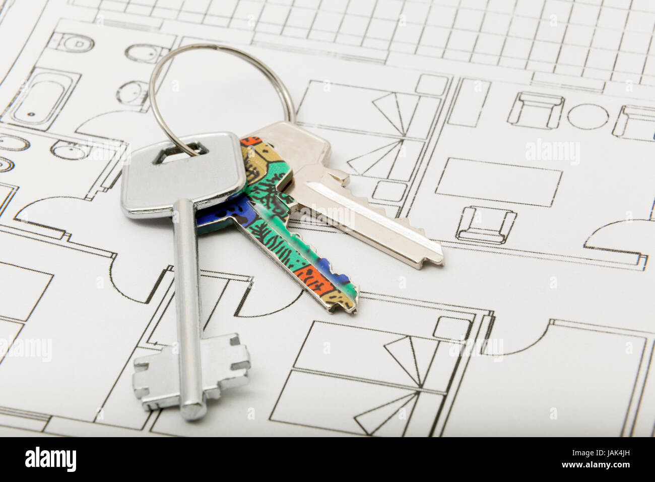 Three keys in white background Stock Photo - Alamy