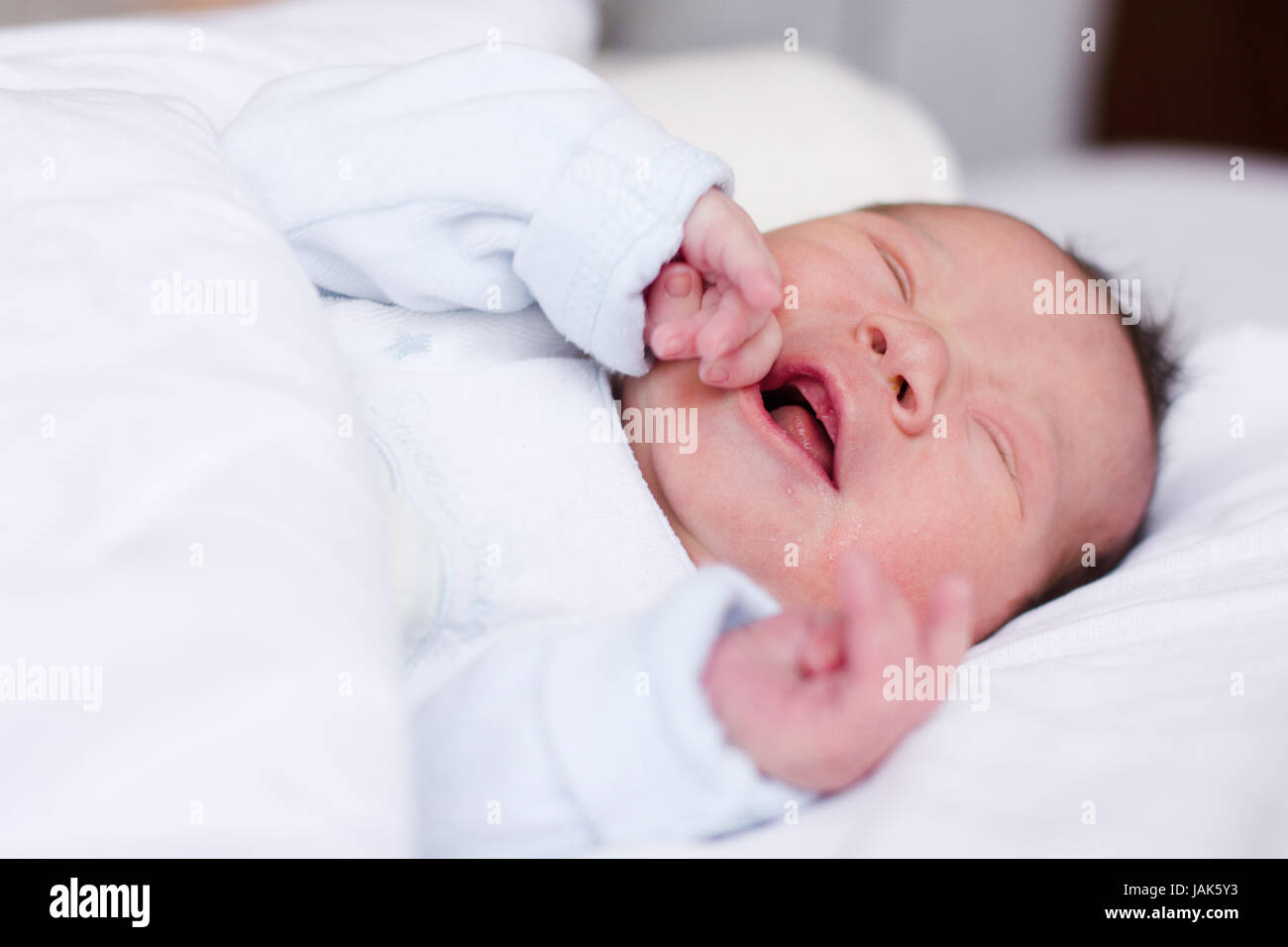Portrait of newborn baby crying Stock Photo - Alamy
