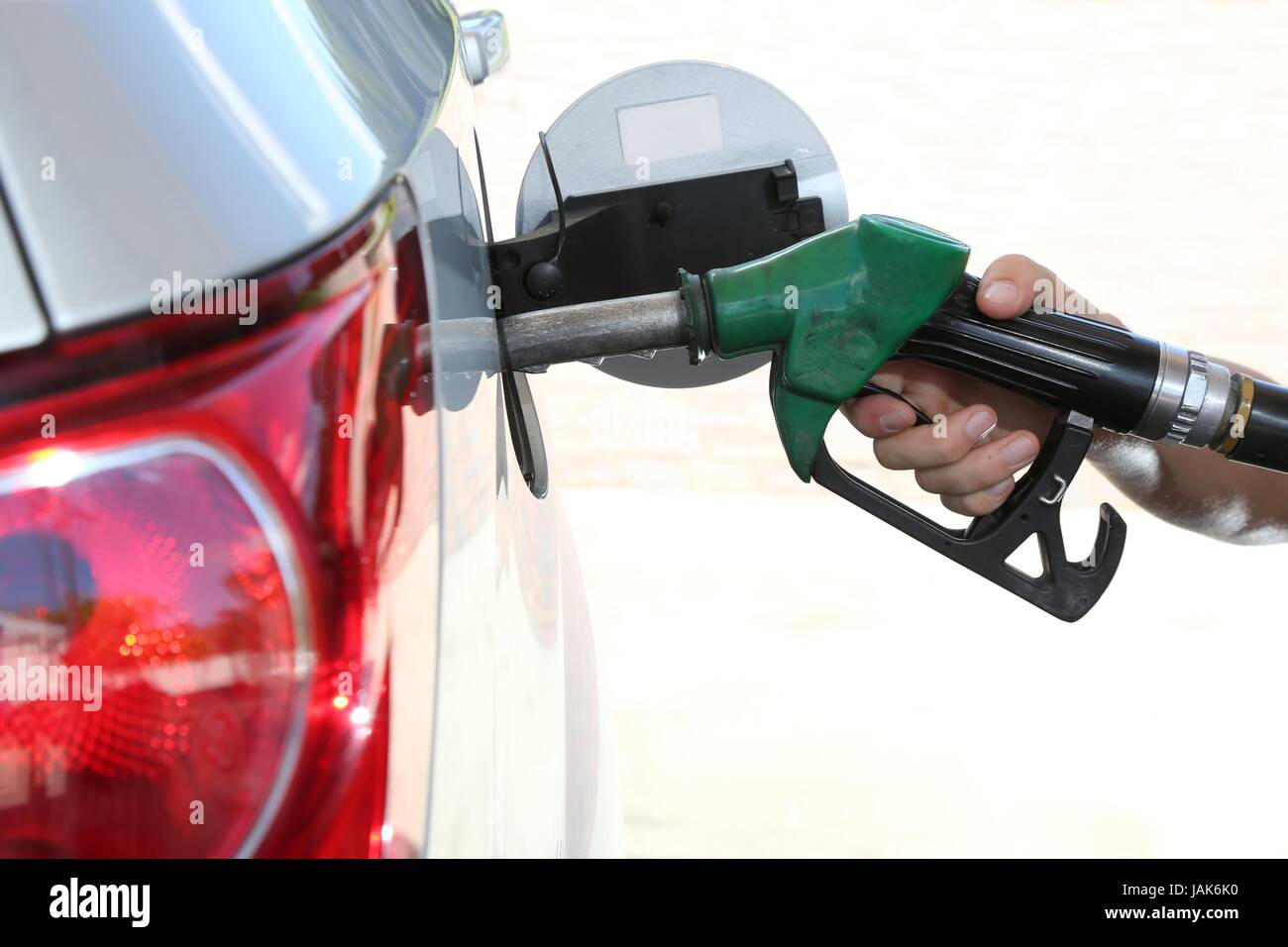 Petrol being pumped for you hi-res stock photography and images - Alamy