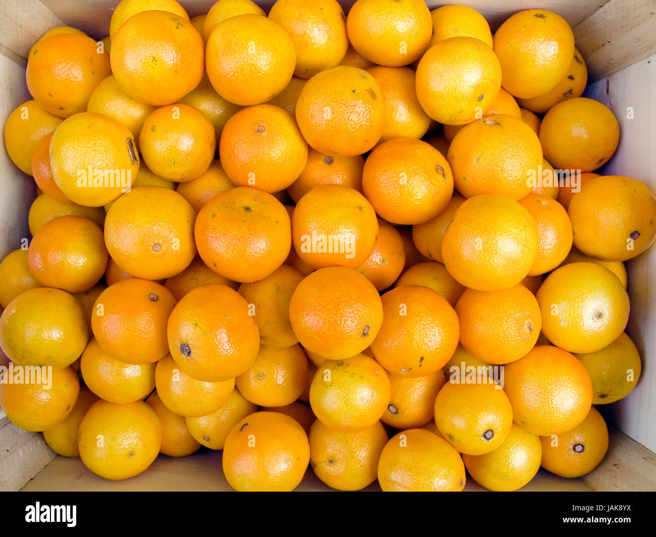 The beautiful tangerines on a counter Stock Photo - Alamy