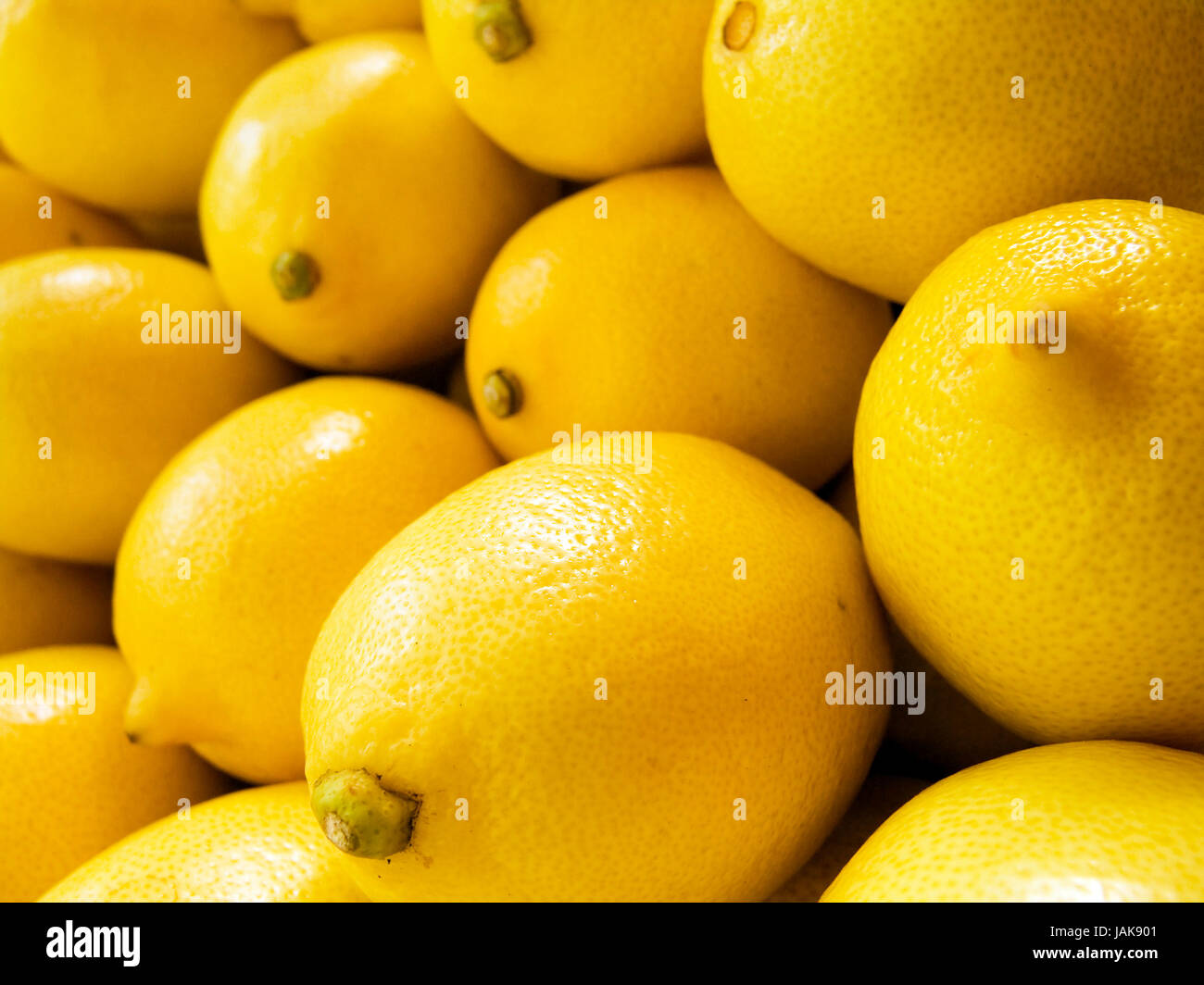 The beautiful yellow lemons on a counter Stock Photo - Alamy