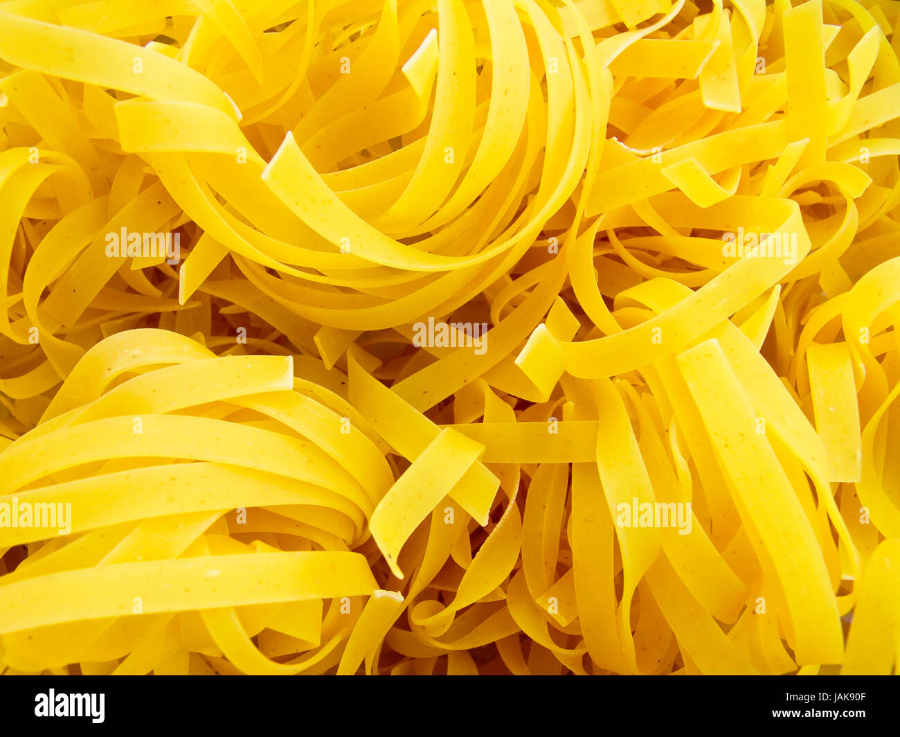 food background a pile of beautiful spaghetti macro Stock Photo - Alamy