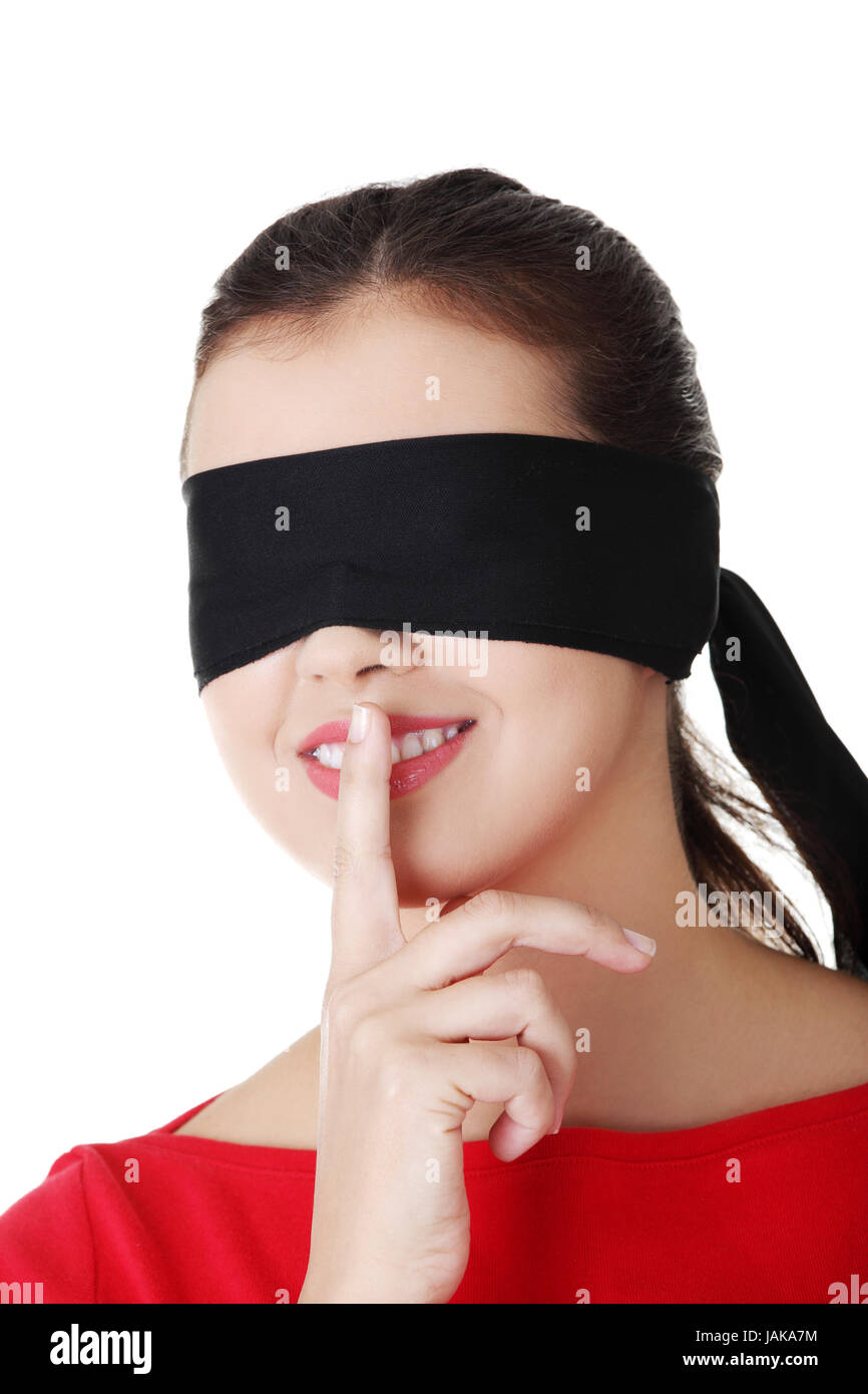 Attractive cheerful girl with band on eyes. Isolated on white Stock ...